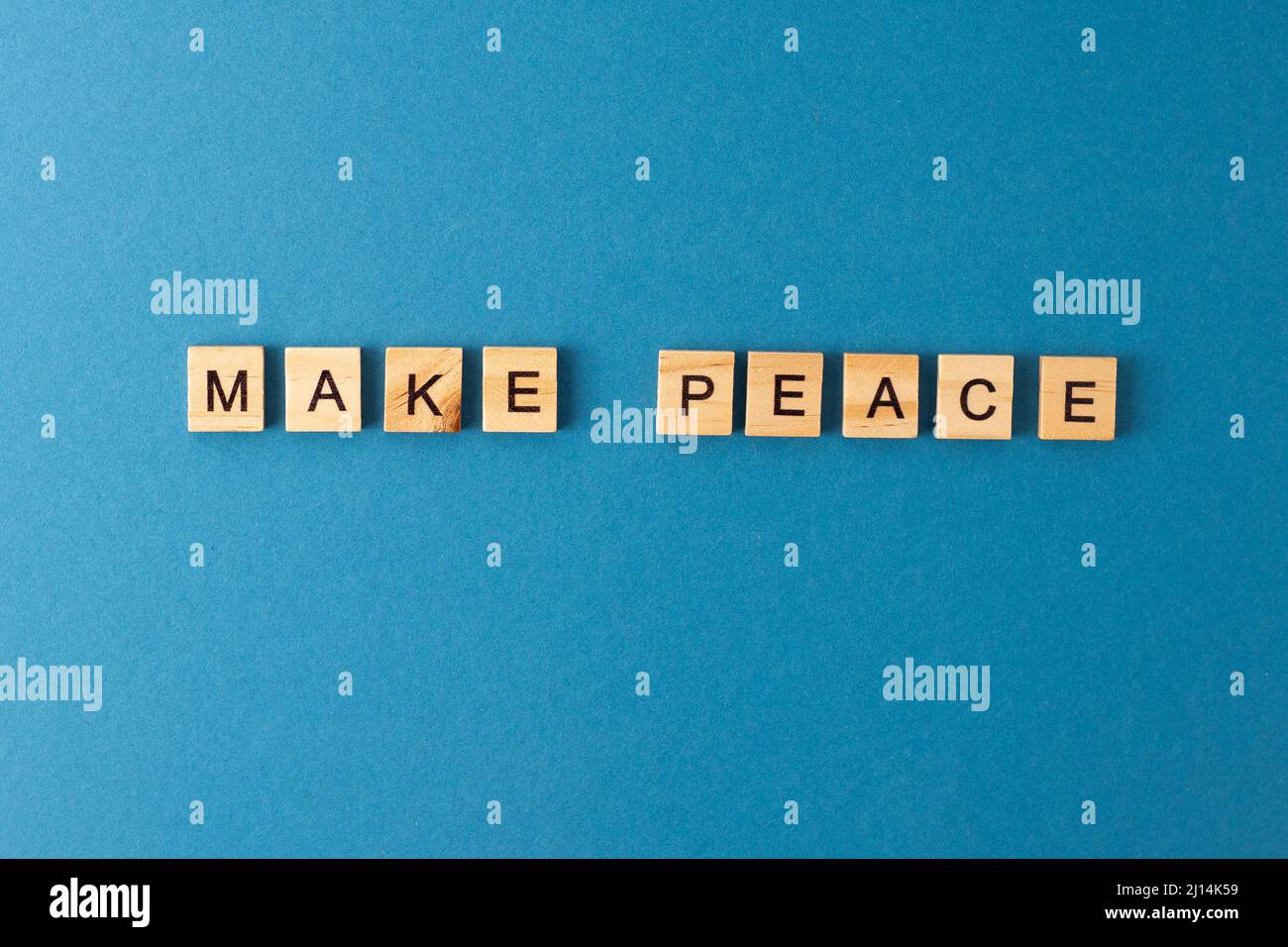 Make peace background. Phrase from wooden letters. Top view words. The ...
