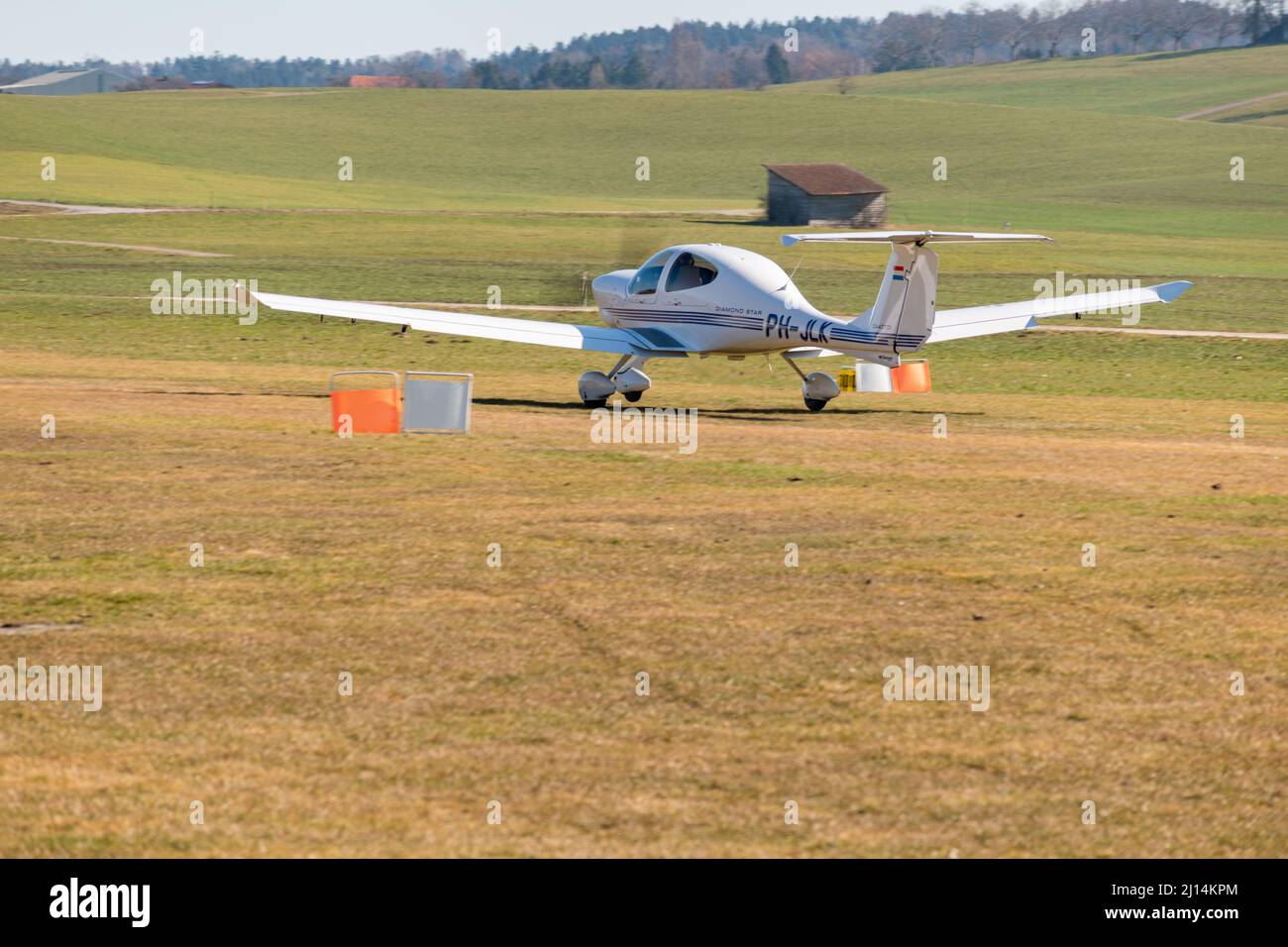Lommis, Switzerland, February 27, 2022 Diamond DA-40 propeller plane is ...
