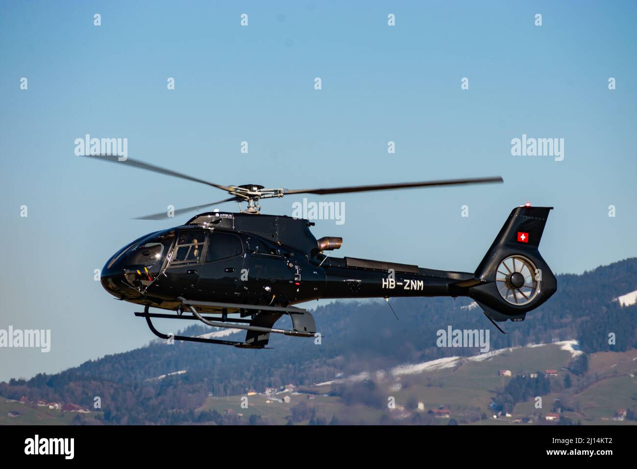 Wangen-Lachen, Switzerland, February 27, 2022 Airbus H130 helicopter is ...
