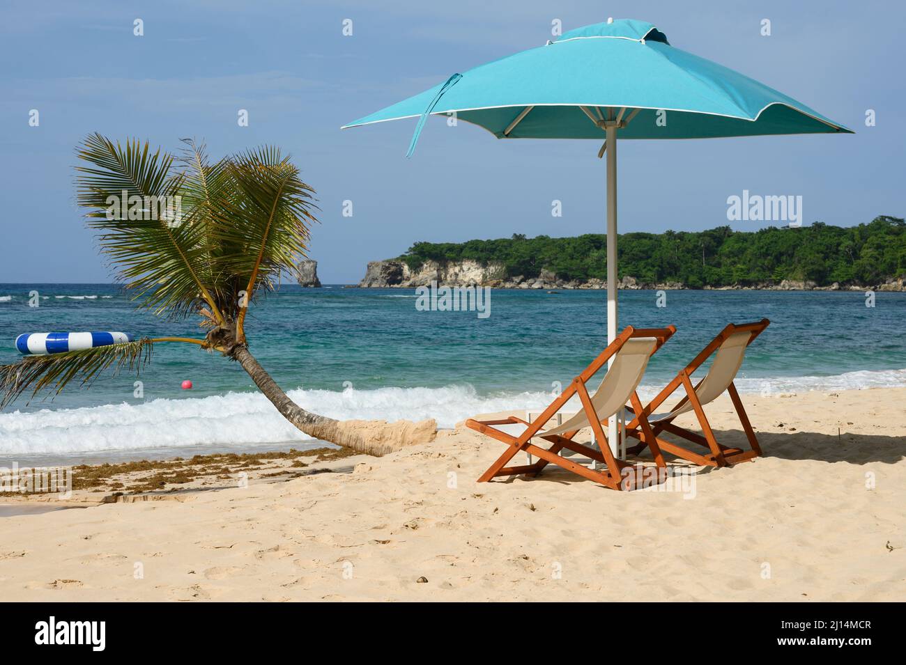 Photo shows Atlantic Ocean beach. Caribbean coastline has yellow sand ...