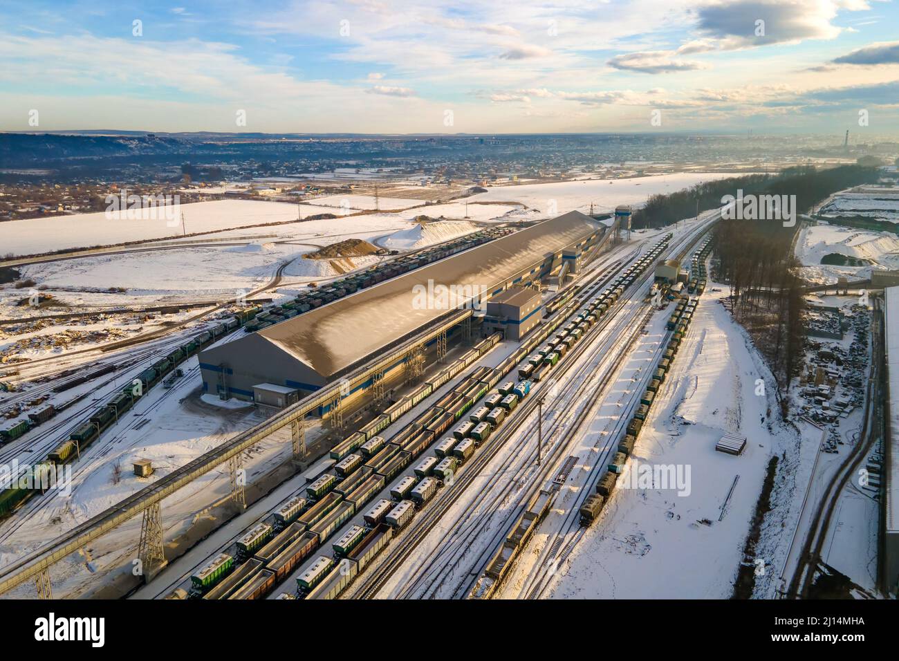Aerial view of cargo train loaded with crushed stone materials at ...
