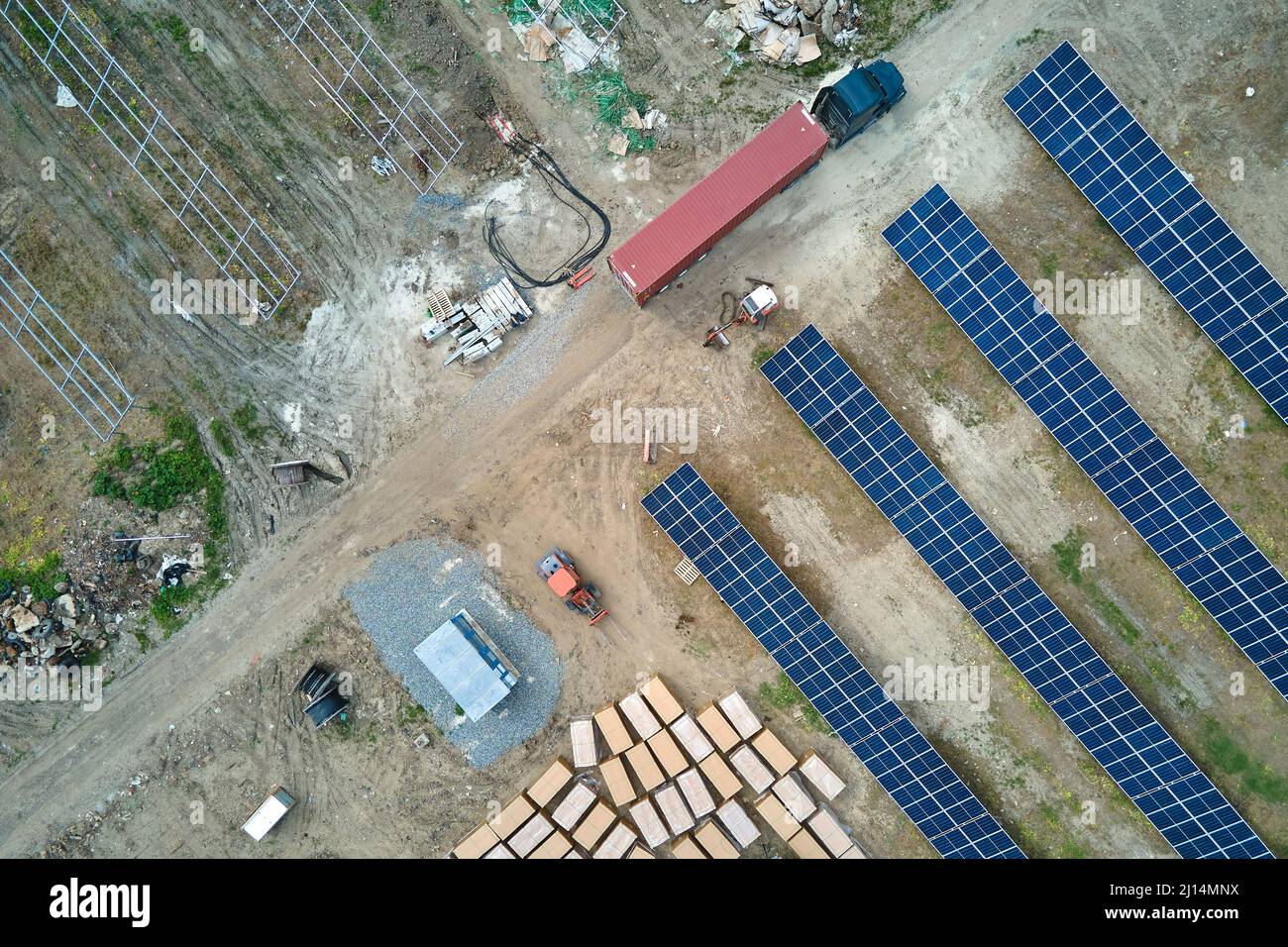 Aerial view of electrical power plant under construction with truck ...