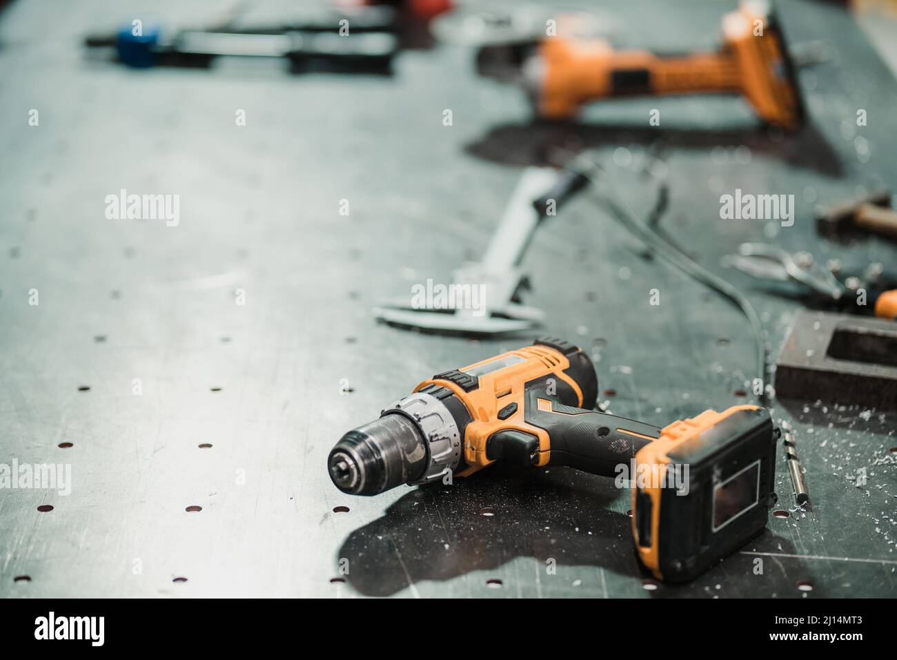 Workshop scene. Tools lying on metallic table in the workshop, garage ...