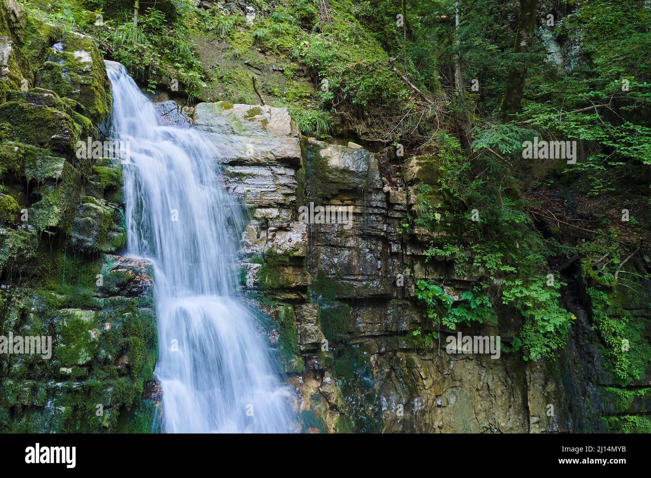 Amazing landscape of beautiful waterfall on mountain river with white ...