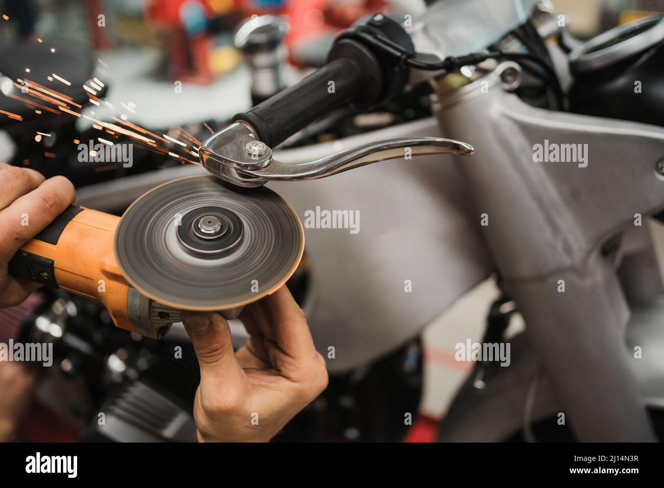 Repairman repair motorcycle, maintenance in garage. Mechanic fixing ...