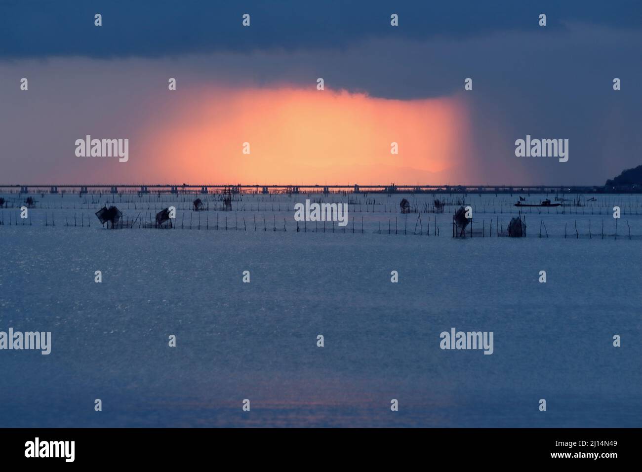 heavy rain clouds dark but there is also the light of the sun shining ...