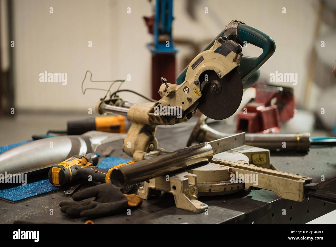 Workshop scene. Tools lying on metallic table in the workshop, garage ...