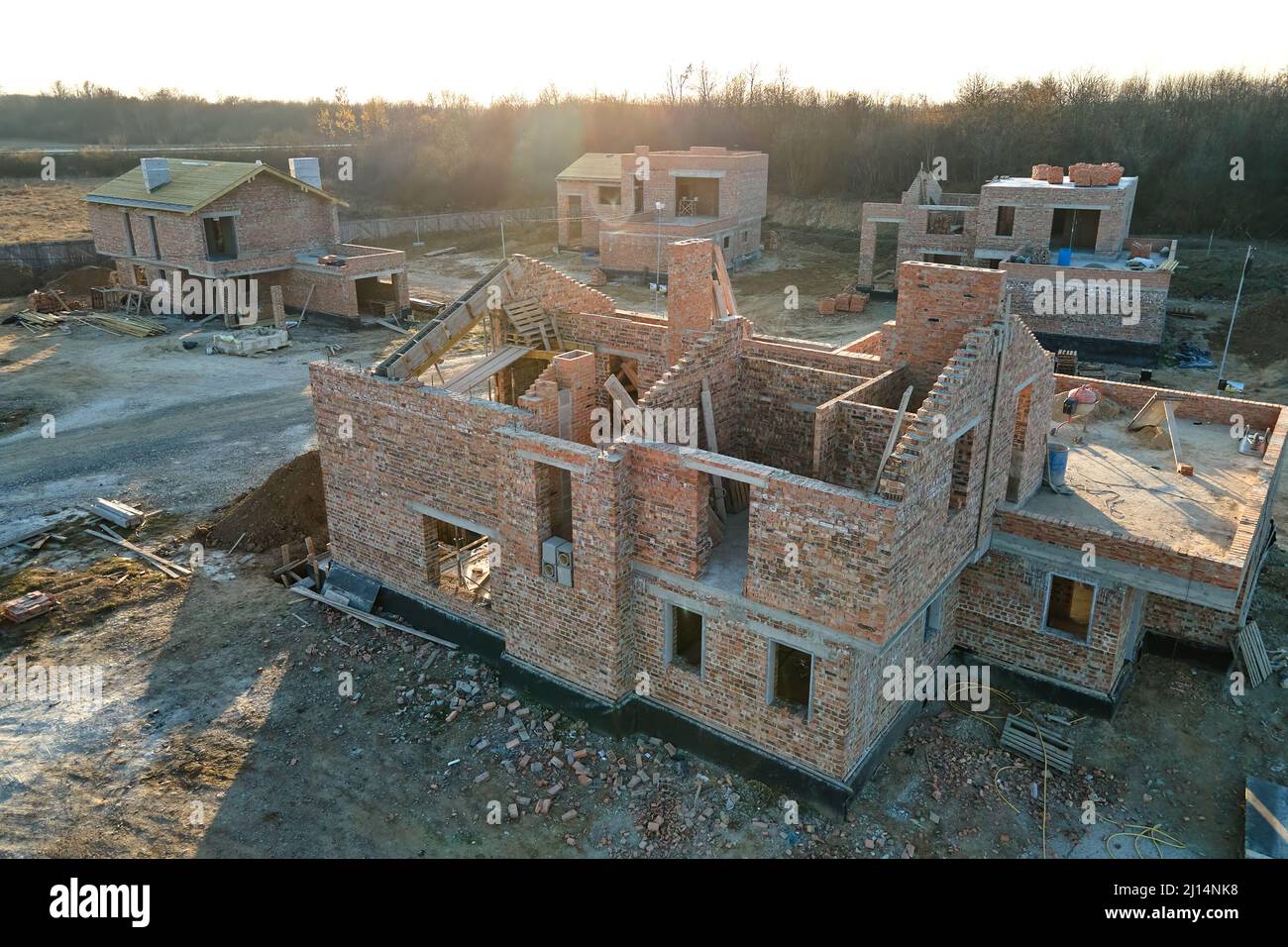 Industrial building site in rural area with residential houses under ...