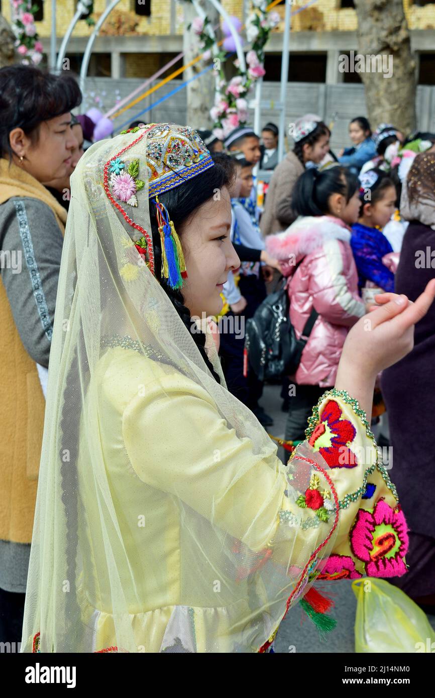 Uzbek young women in national costumes at Navruz spring festival Stock ...