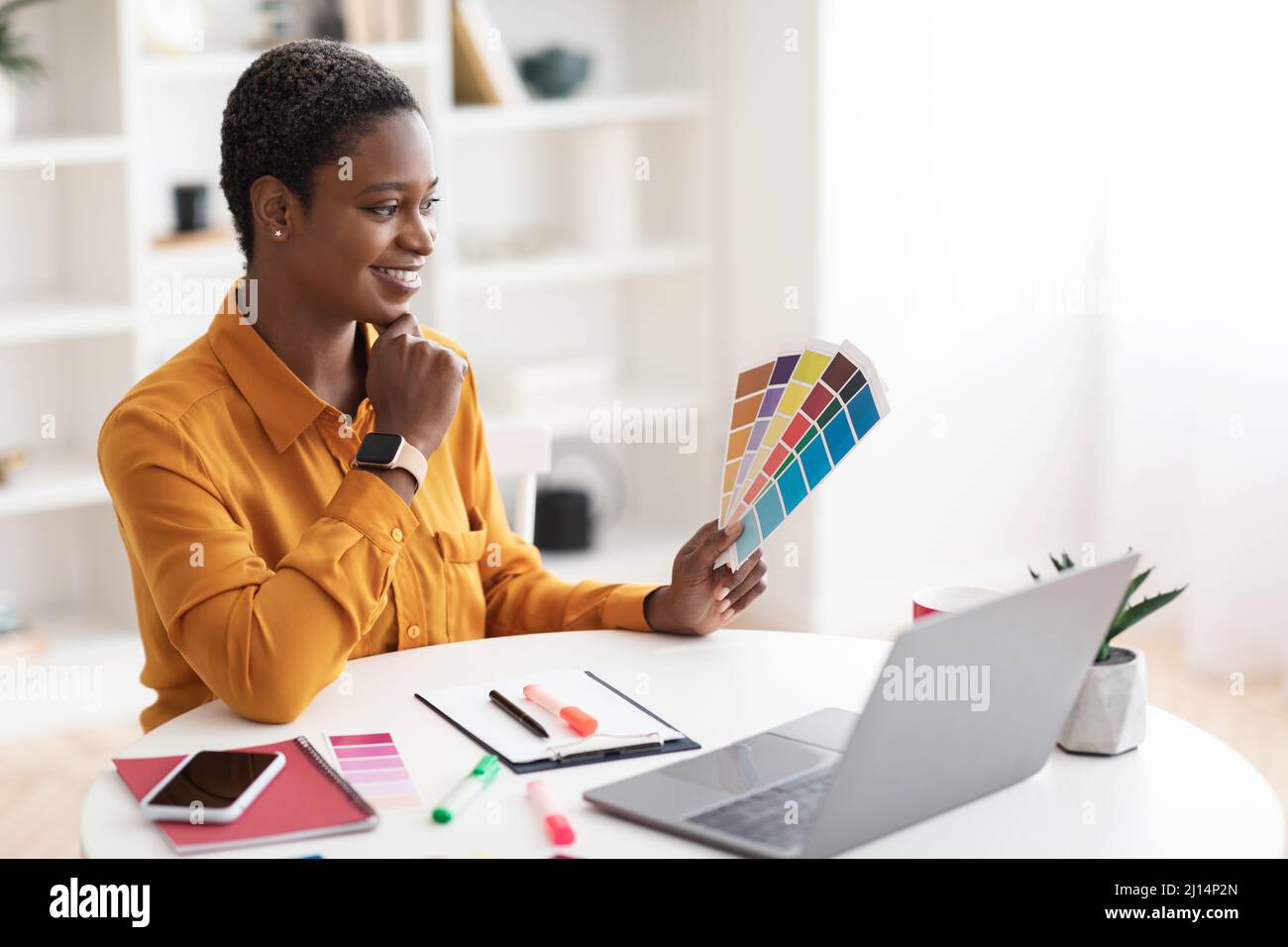 Young designer freelancer working hi-res stock photography and images ...