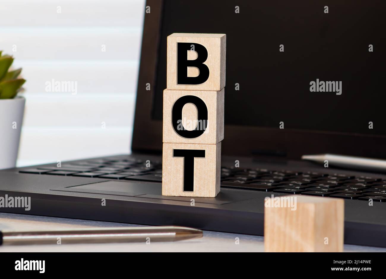 Colorful alphabet blocks spelling the word BOT Stock Photo - Alamy