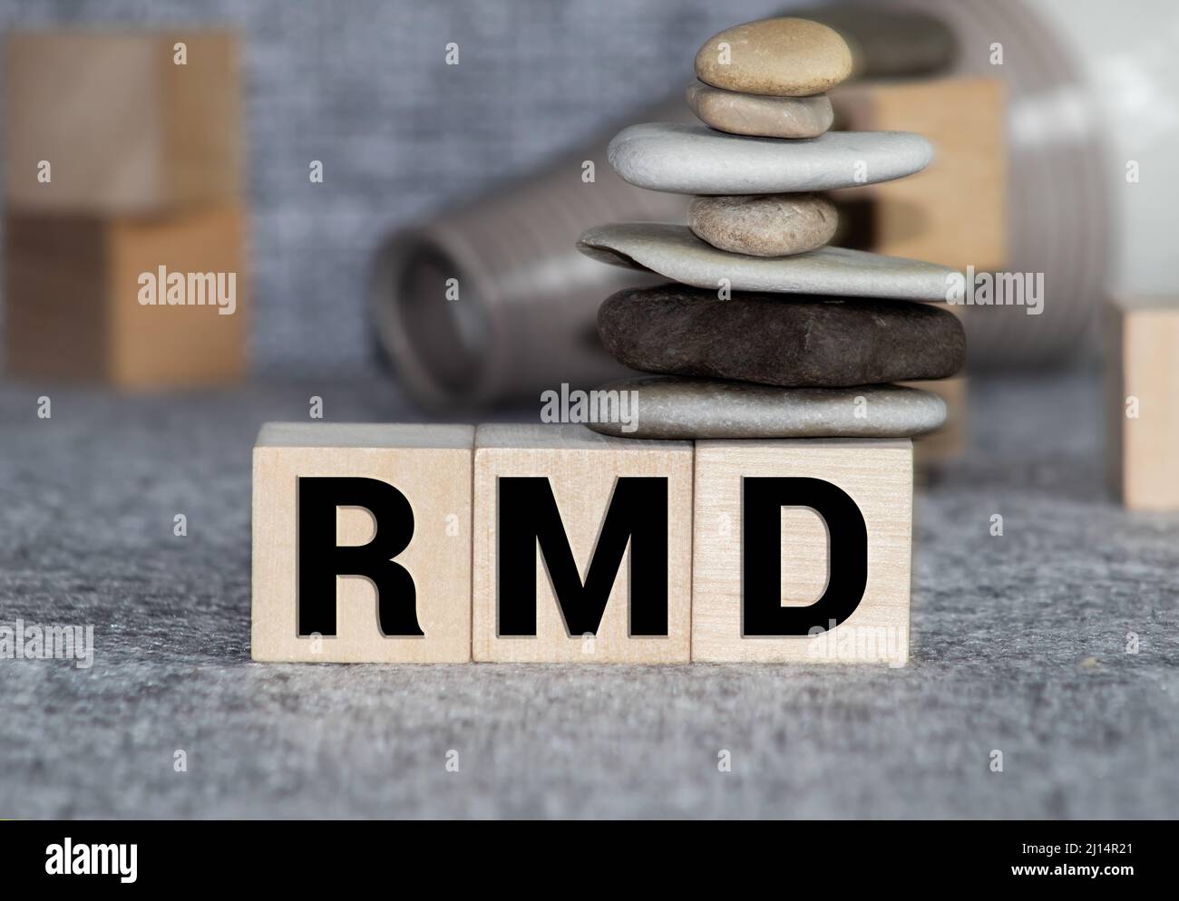 wooden block with words RMD required minimum distributions Stock Photo ...