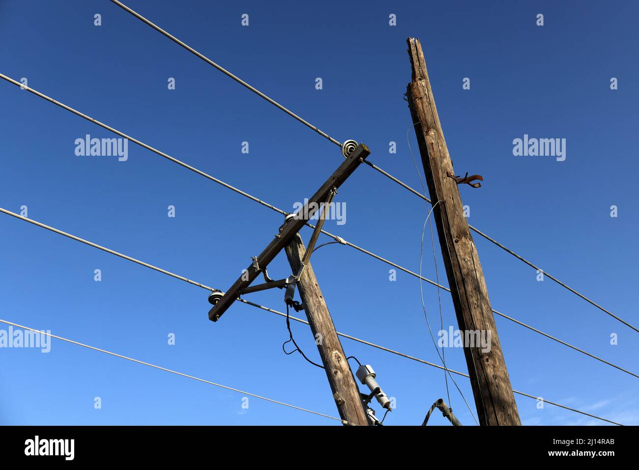 Broken utility pole hi-res stock photography and images - Alamy