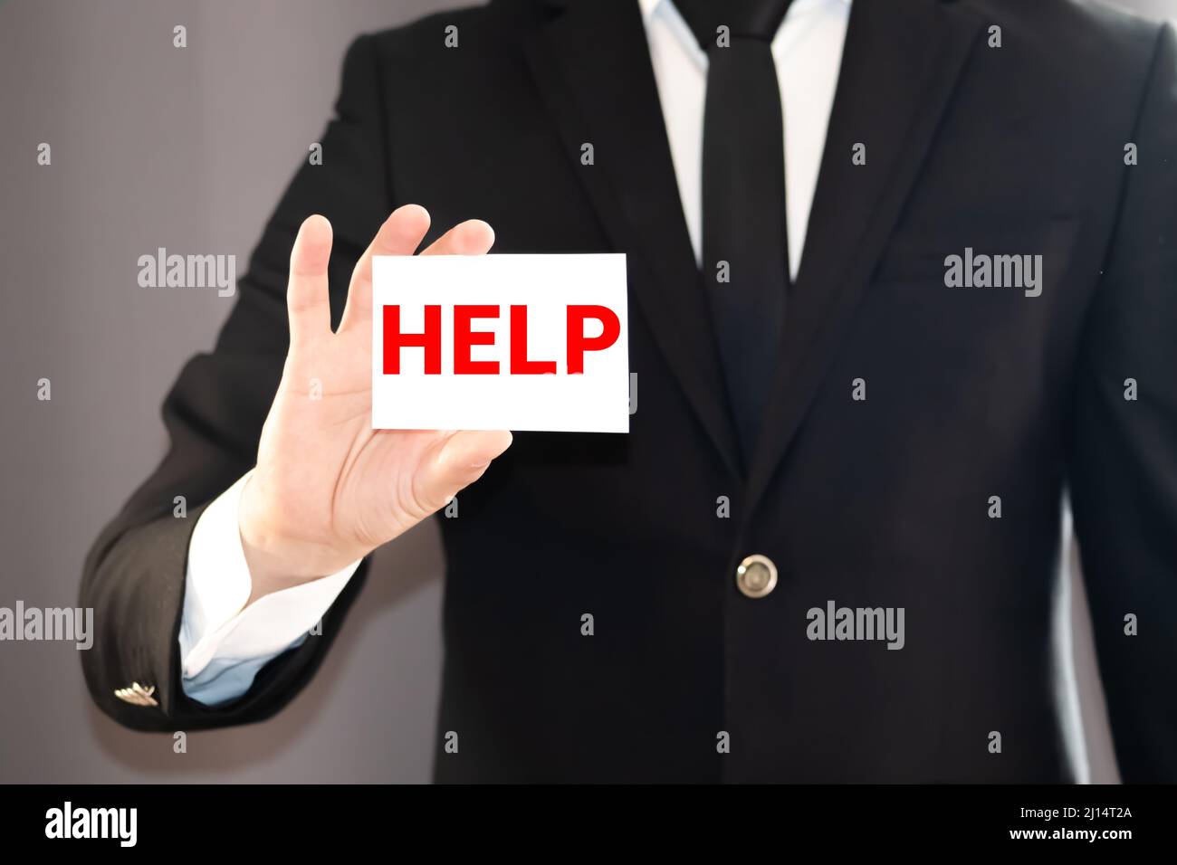 man needs help with homework. Little boy with paper with Help word ...