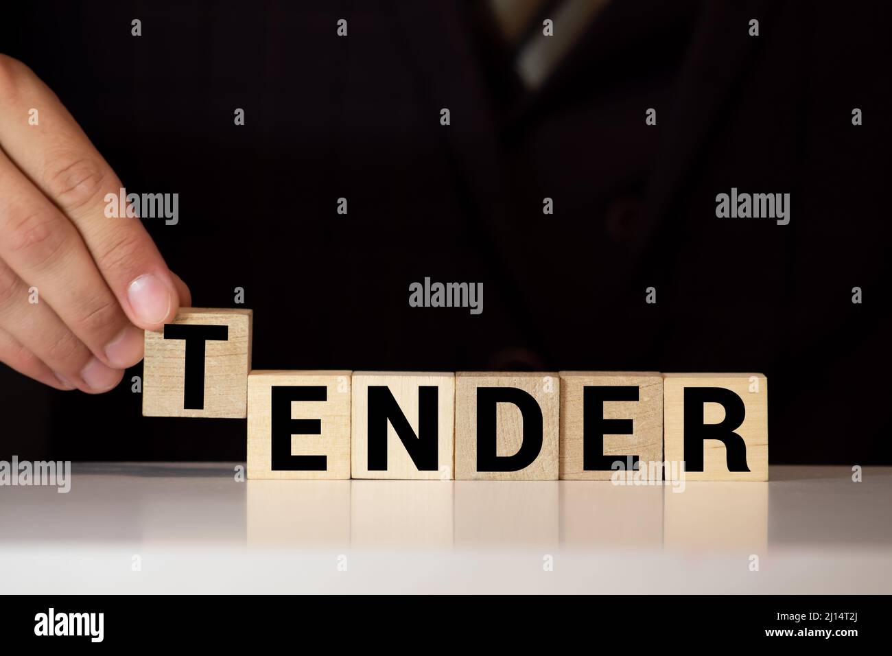 Man made word TENDER with wood blocks Stock Photo - Alamy