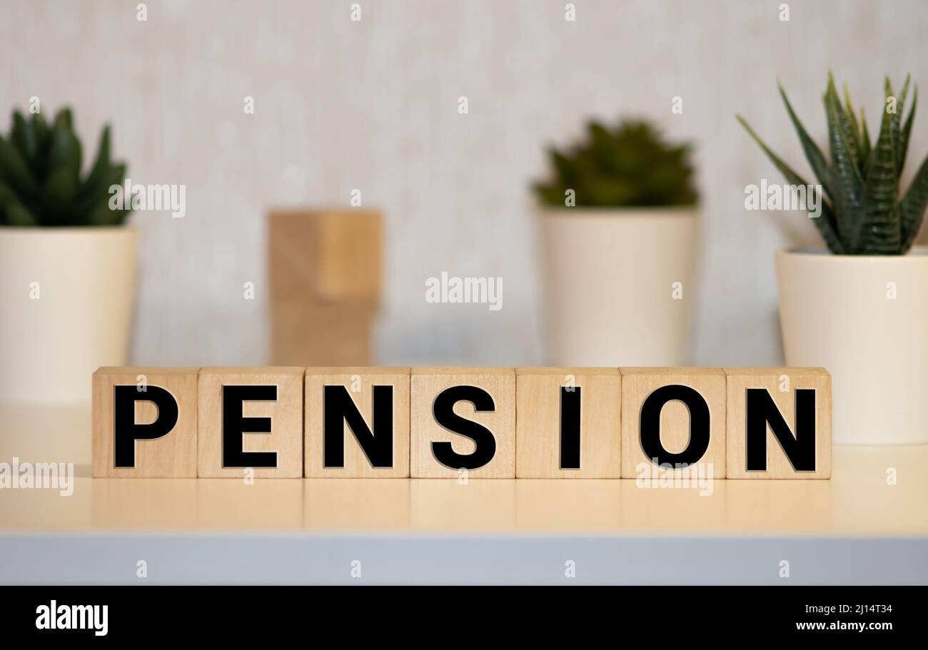 PENSION word on block concept, business concept Stock Photo - Alamy