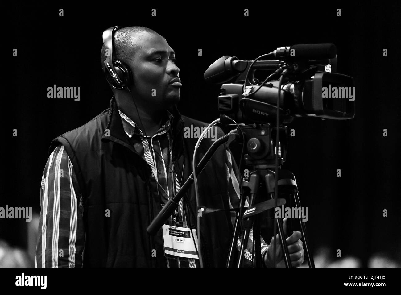Johannesburg, South Africa - October 22, 2014: African cameraman ...
