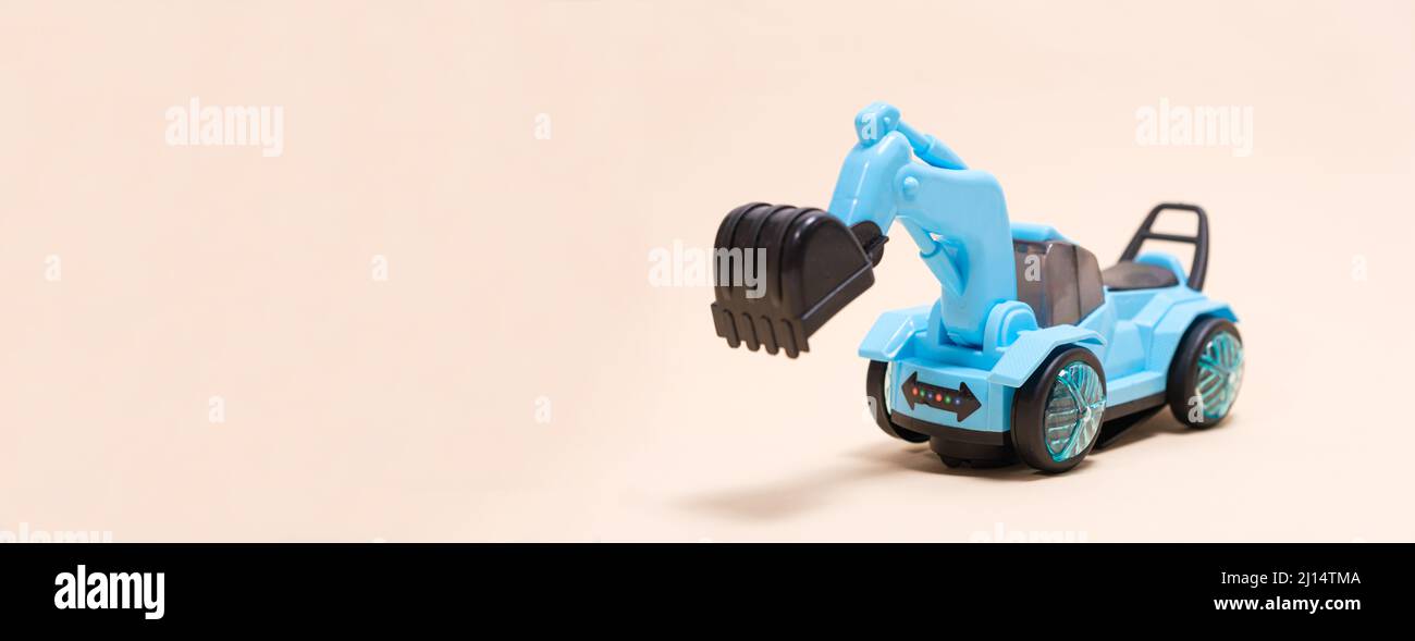 Blue excavator plastic machine on white background. Construction ...