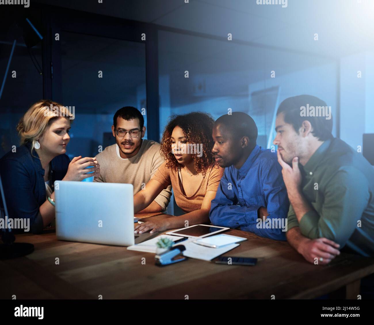 This team goes the extra mile. Shot of a team of young businesspeople ...