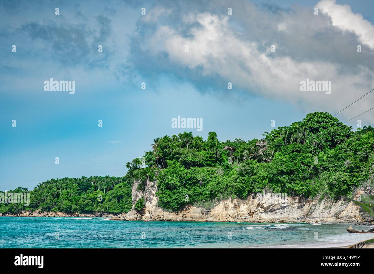 Photo of a sandy beach in the foreground from the Dominican Republic ...