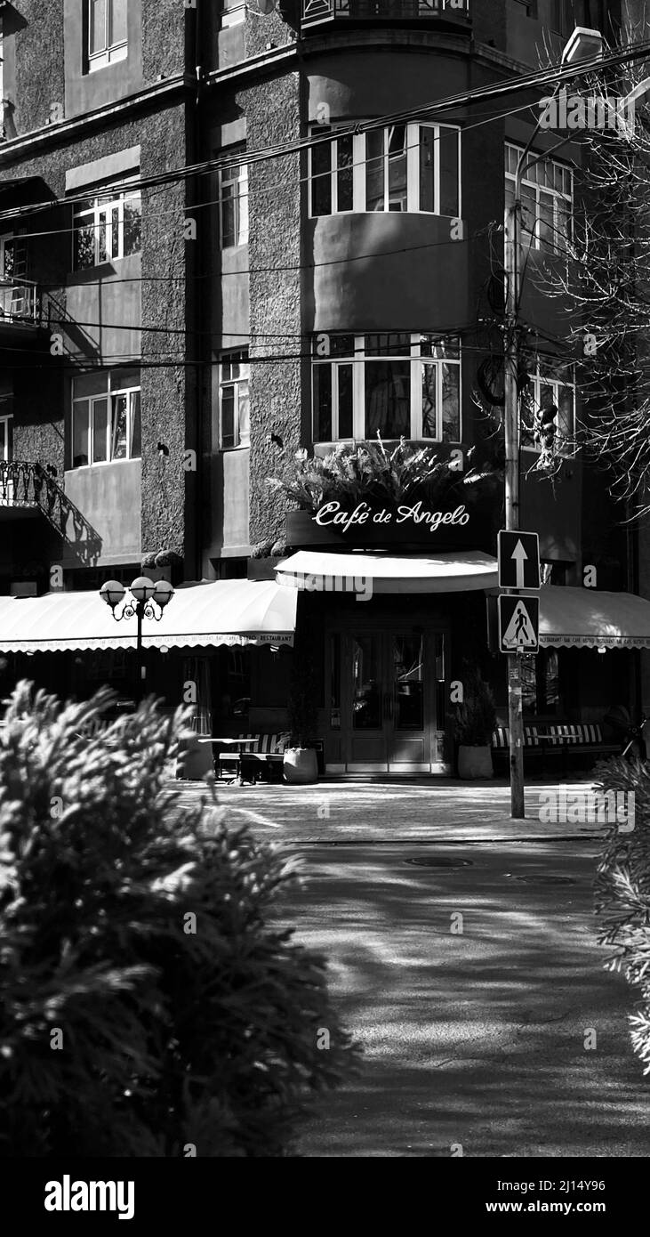 Vertical grayscale shot of the De Angelo, a newly opened restaurant ...