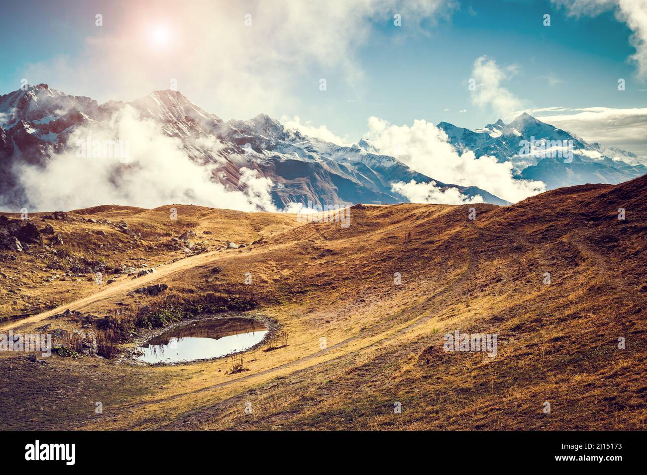 Fantastic lake Koruldi at the foot of Mt. Ushba. Dramatic scene ...