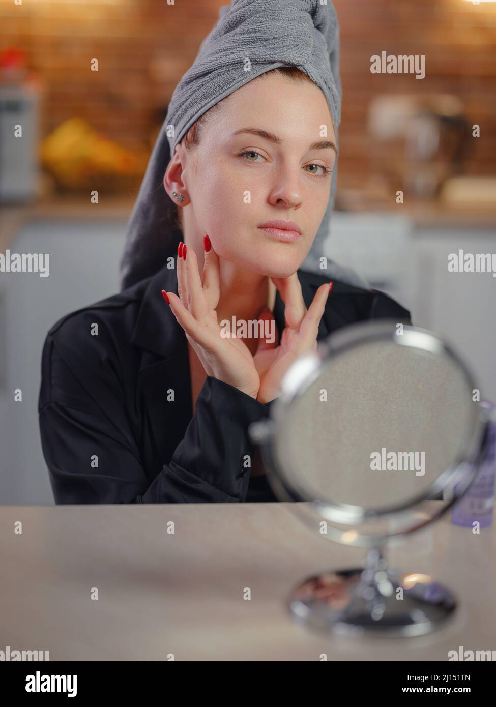 Happy beautiful young woman satisfied with professional cosmetic ...