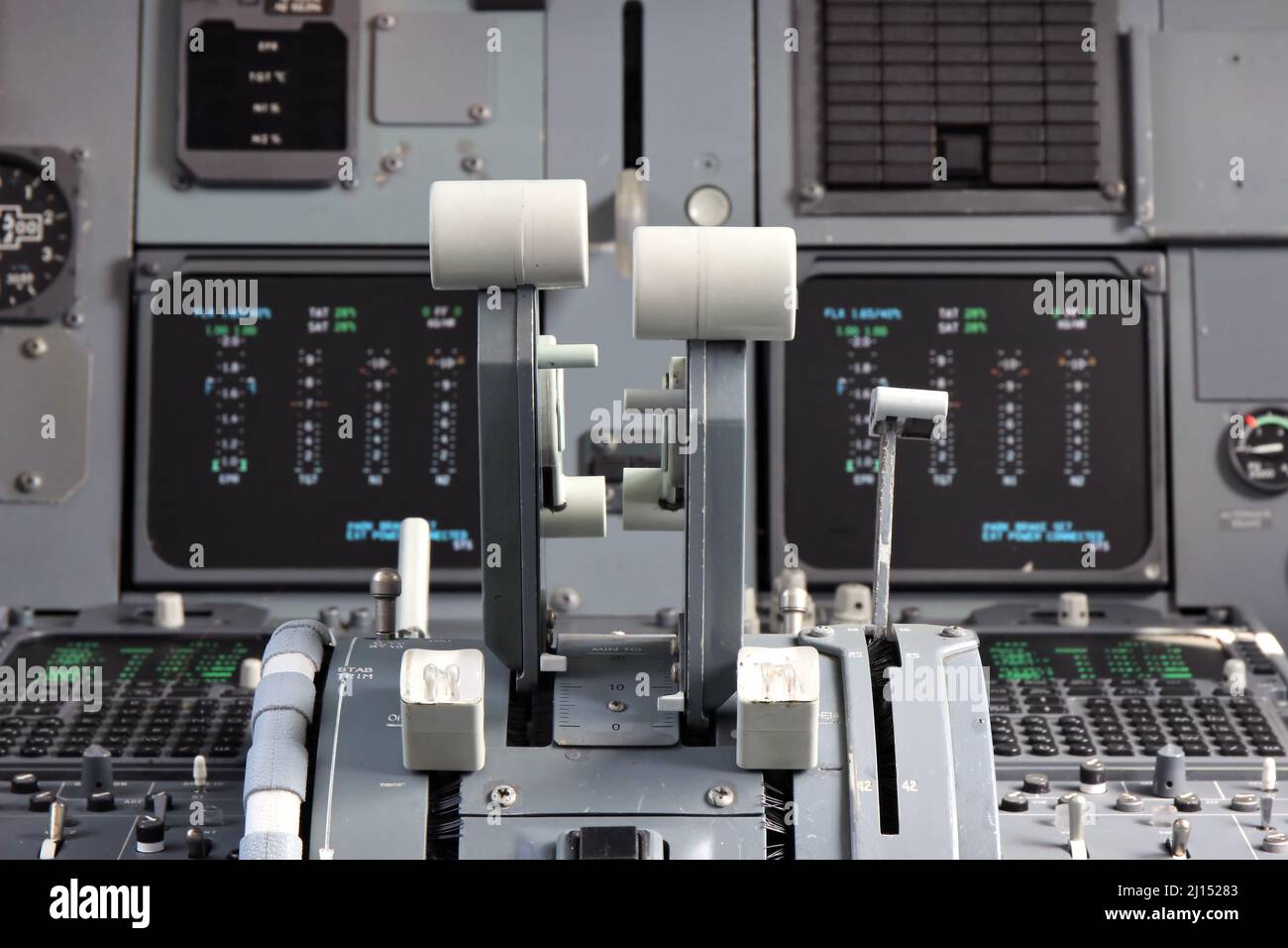 thrust levers of a twin engined airliner Stock Photo - Alamy