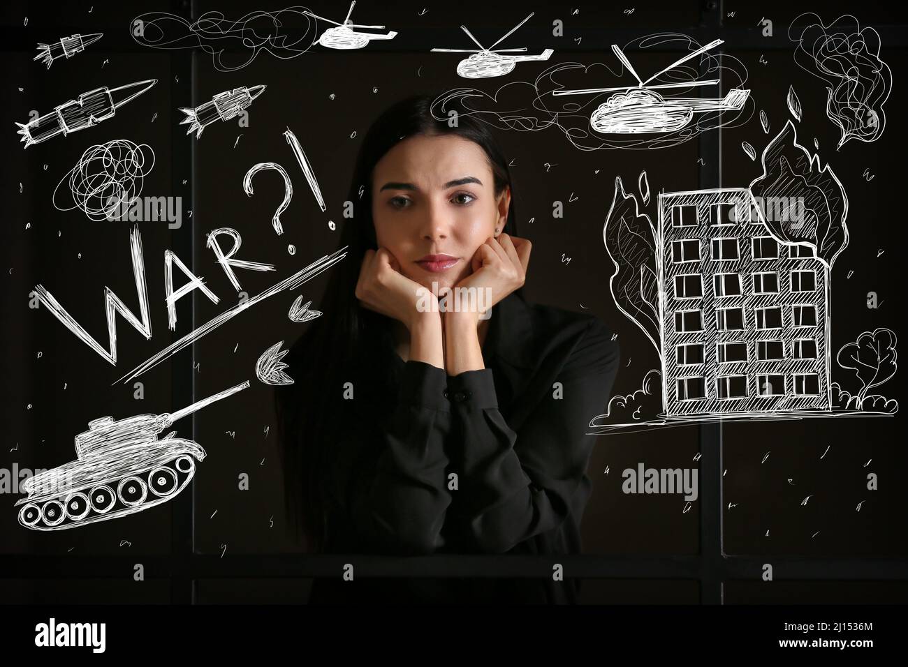 Sad young woman, drawn tank, helicopters, destroyed building and ...