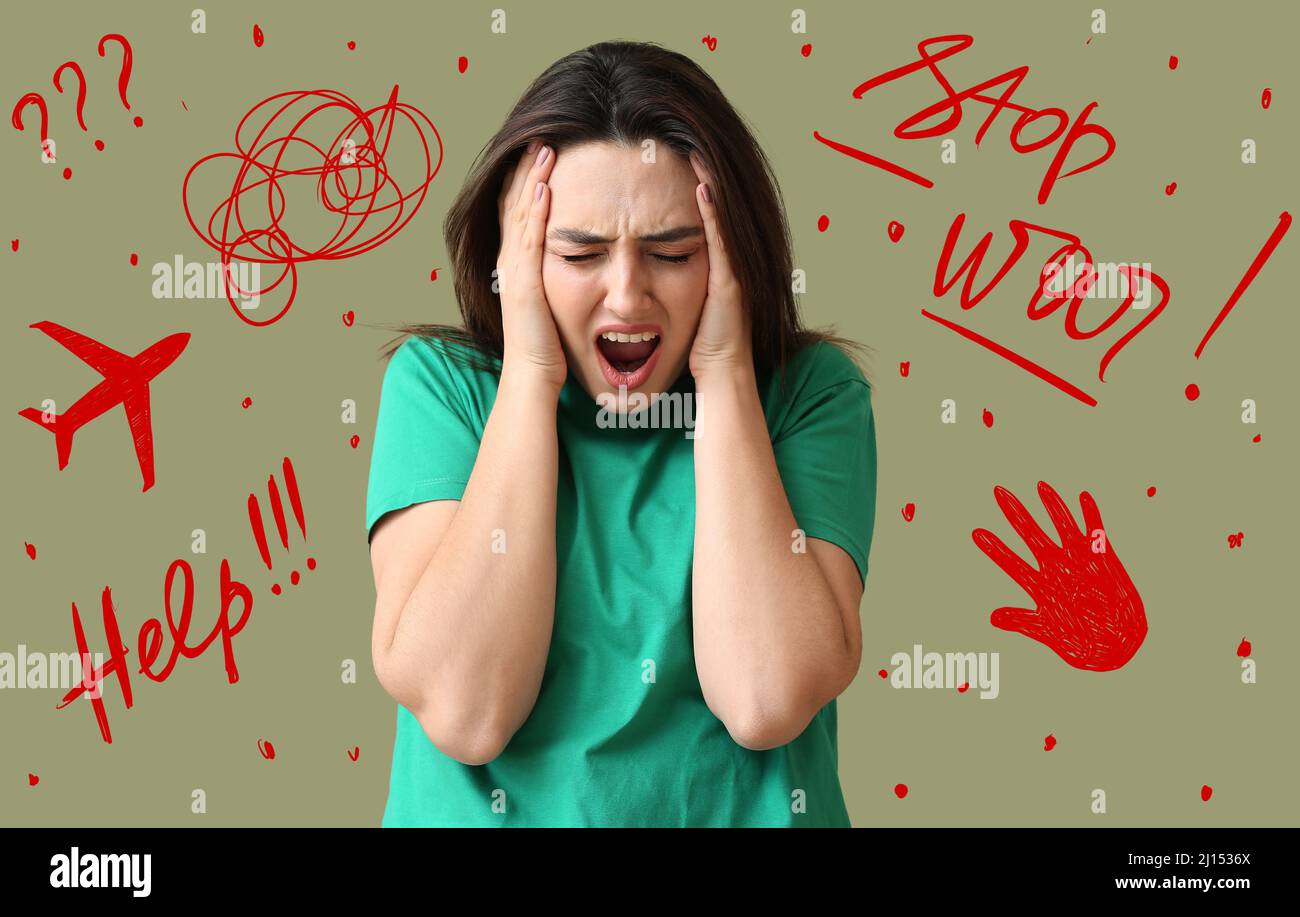 Scared young woman on color background. Horrors of war Stock Photo - Alamy