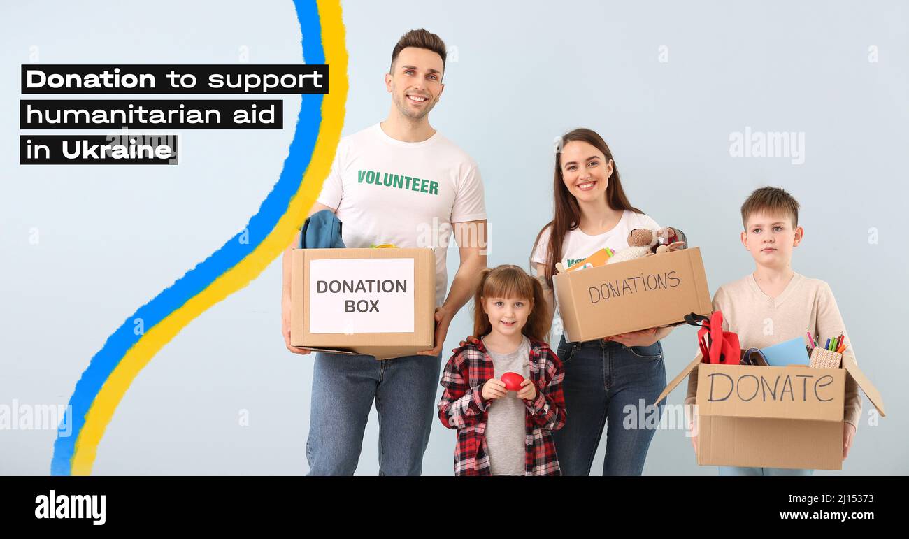 Volunteers with donation boxes and ribbon in colors of Ukrainian flag ...