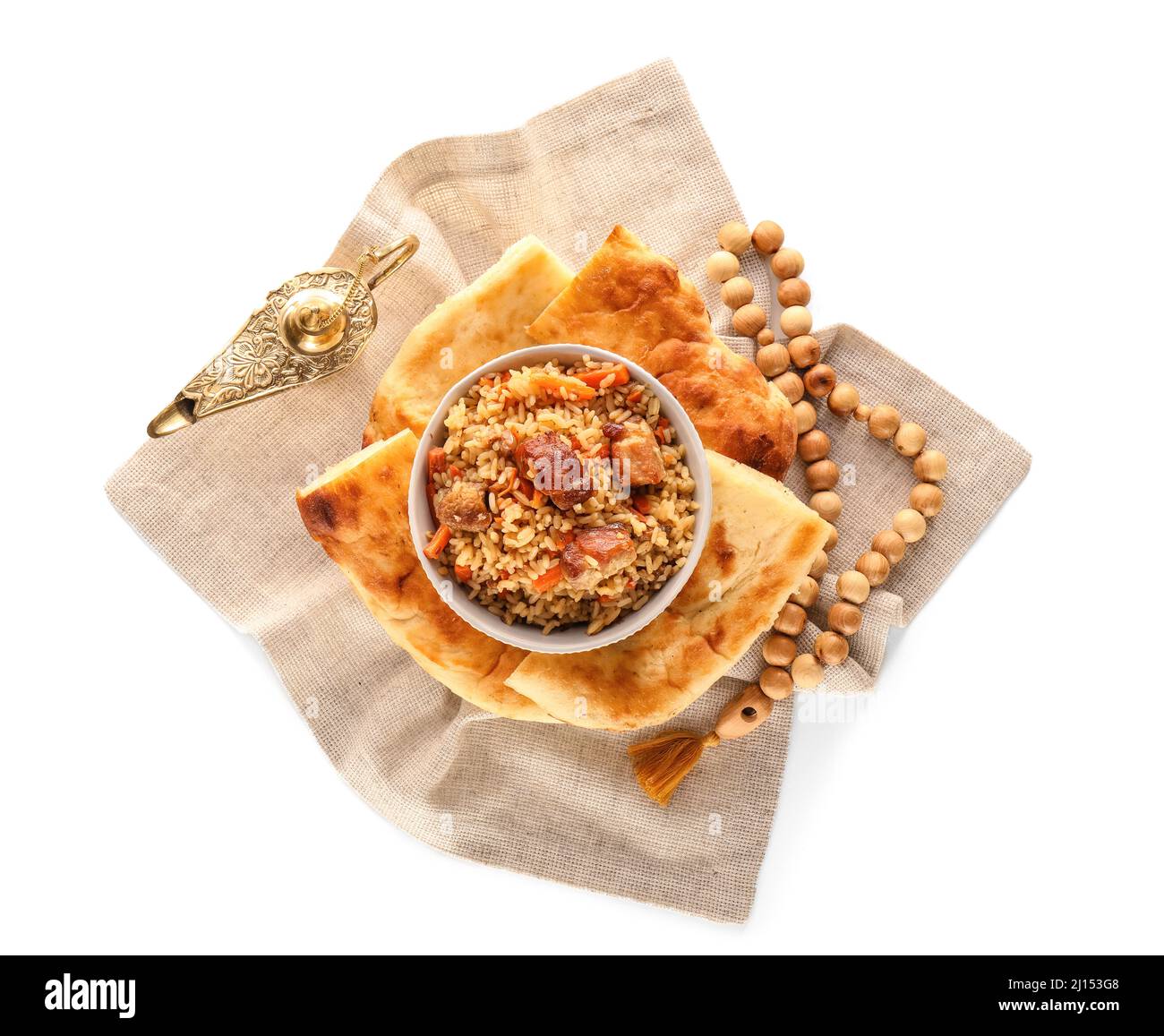 Bowl of tasty Asian pilaf and flatbread on white background Stock Photo ...