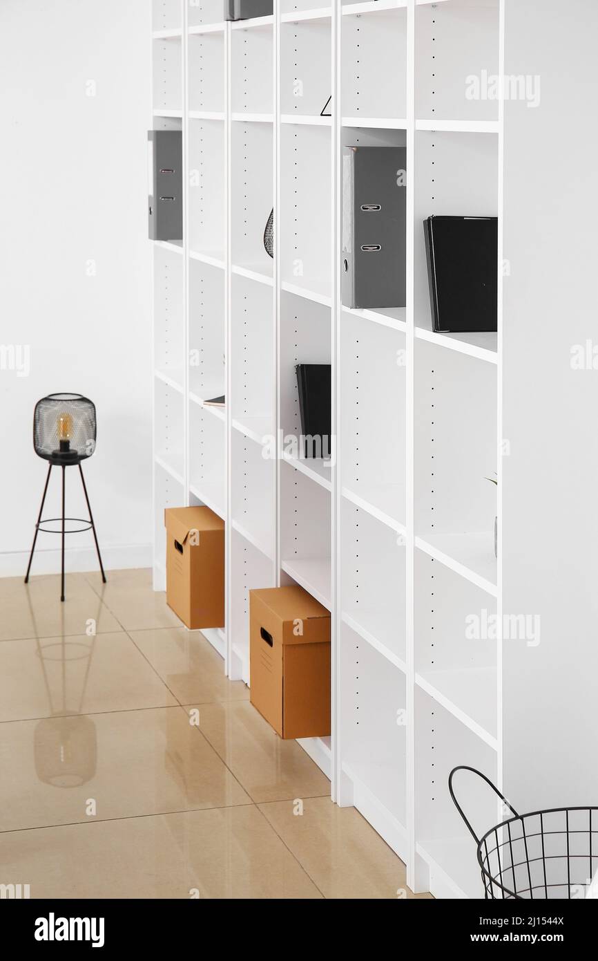 Modern shelf unit in office Stock Photo - Alamy