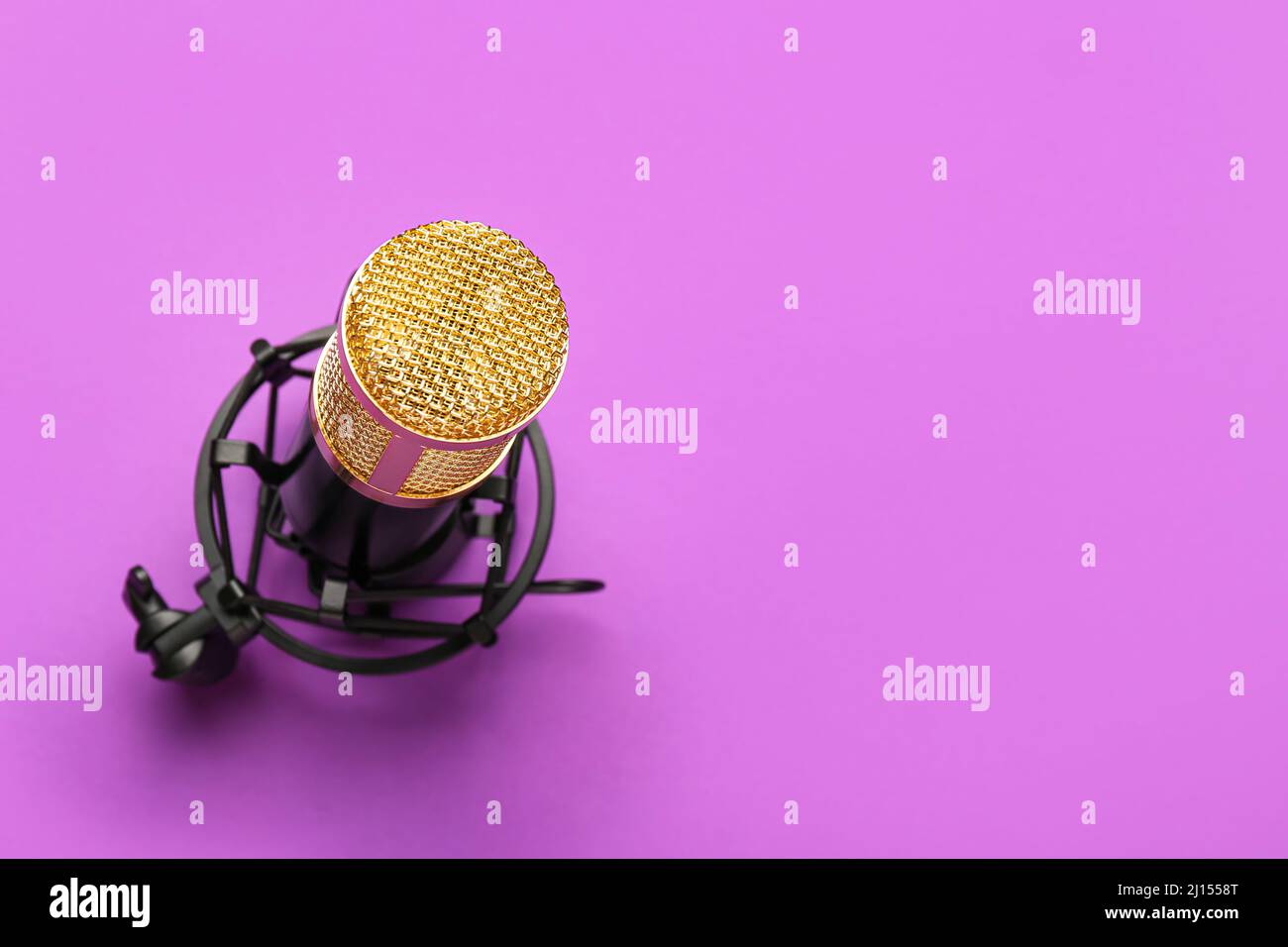Modern microphone on purple hi-res stock photography and images - Alamy
