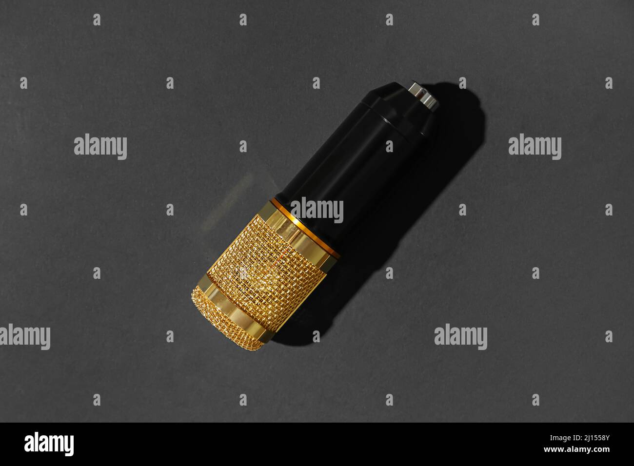 New modern microphone on dark background Stock Photo - Alamy