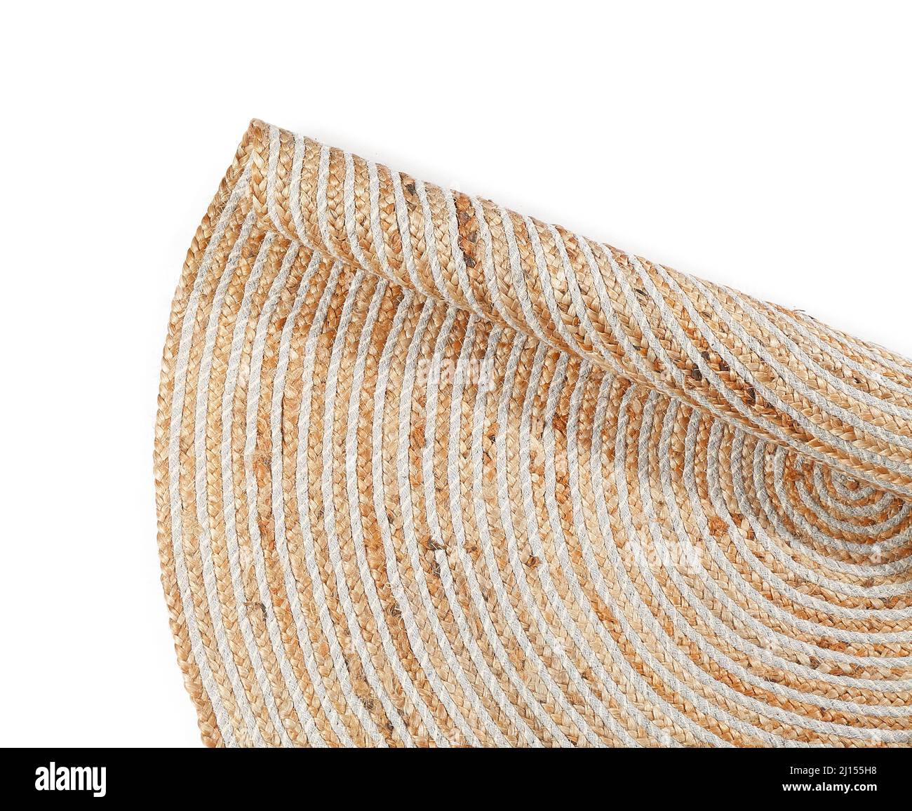 Round wicker carpet on white background Stock Photo - Alamy