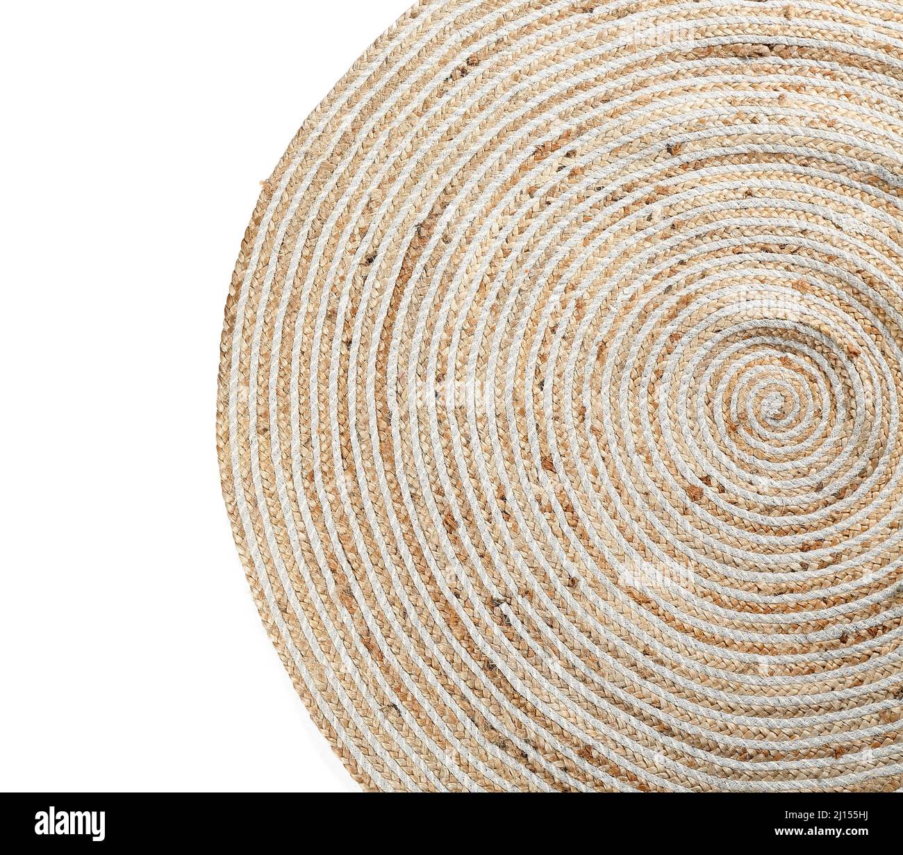 Round wicker carpet on white background, closeup Stock Photo - Alamy