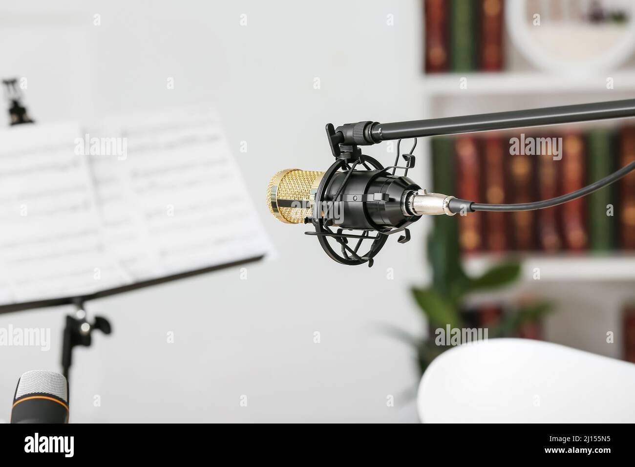 Modern microphone in room hi-res stock photography and images - Alamy