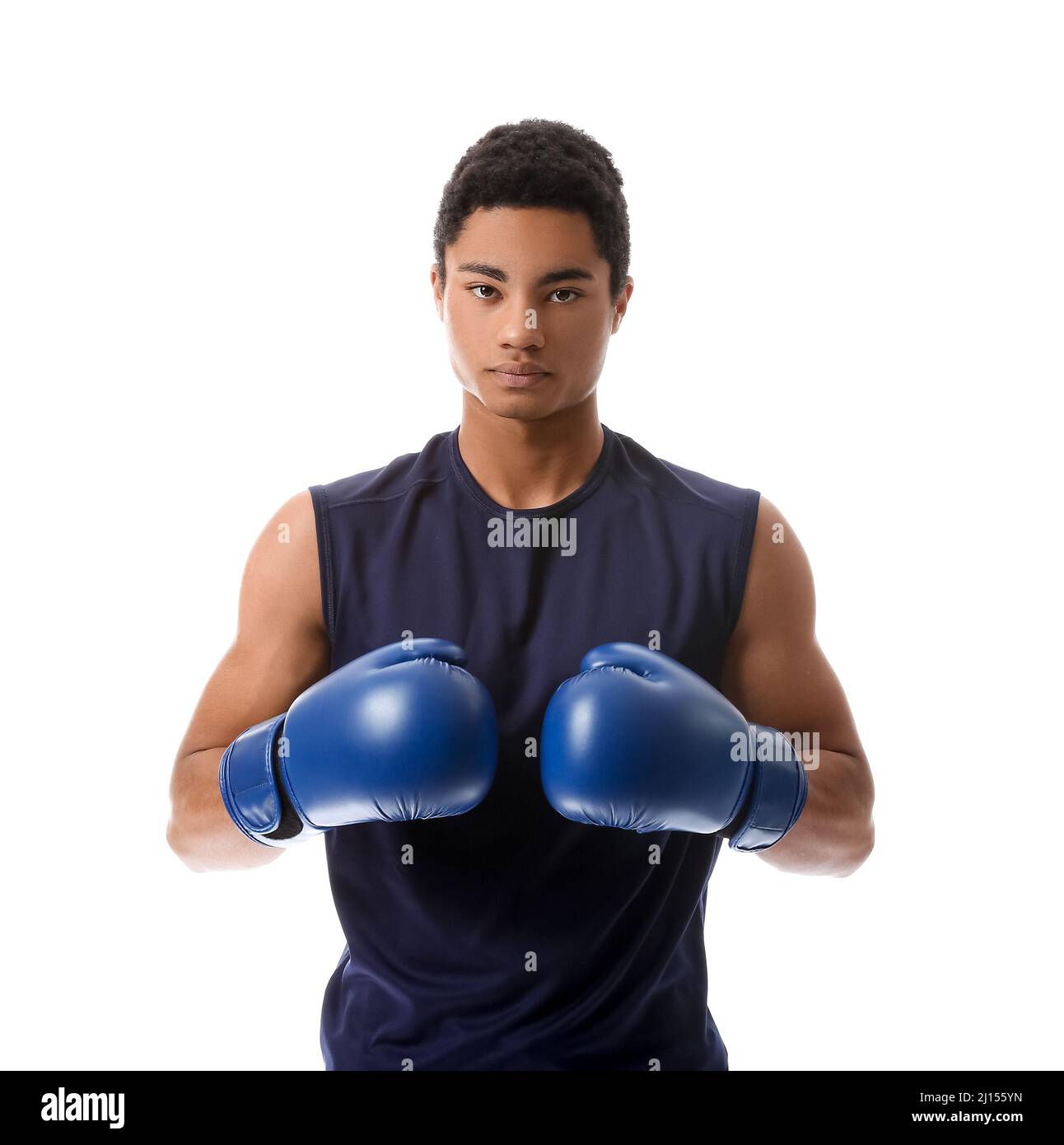 Young African-American man with boxing gloves on white background ...