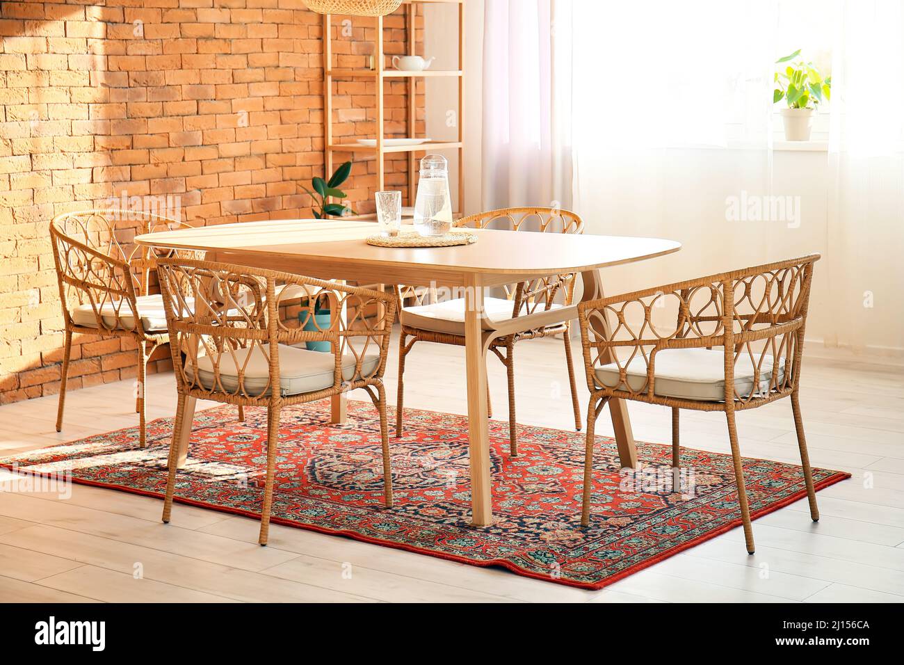 Interior of modern dining room with table and vintage carpet Stock ...