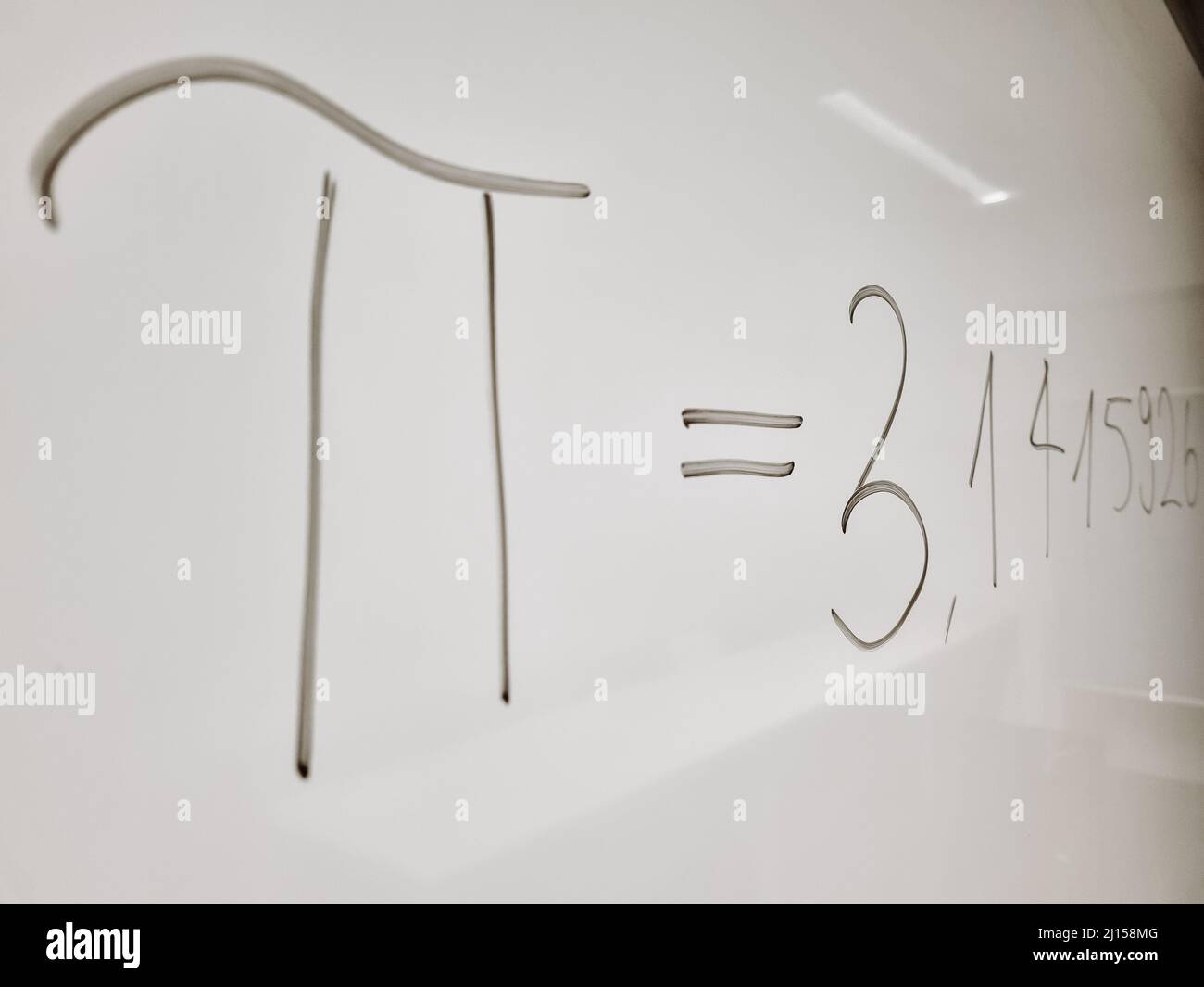 mathematical symbols of an equation from a mathematics lecture on a ...