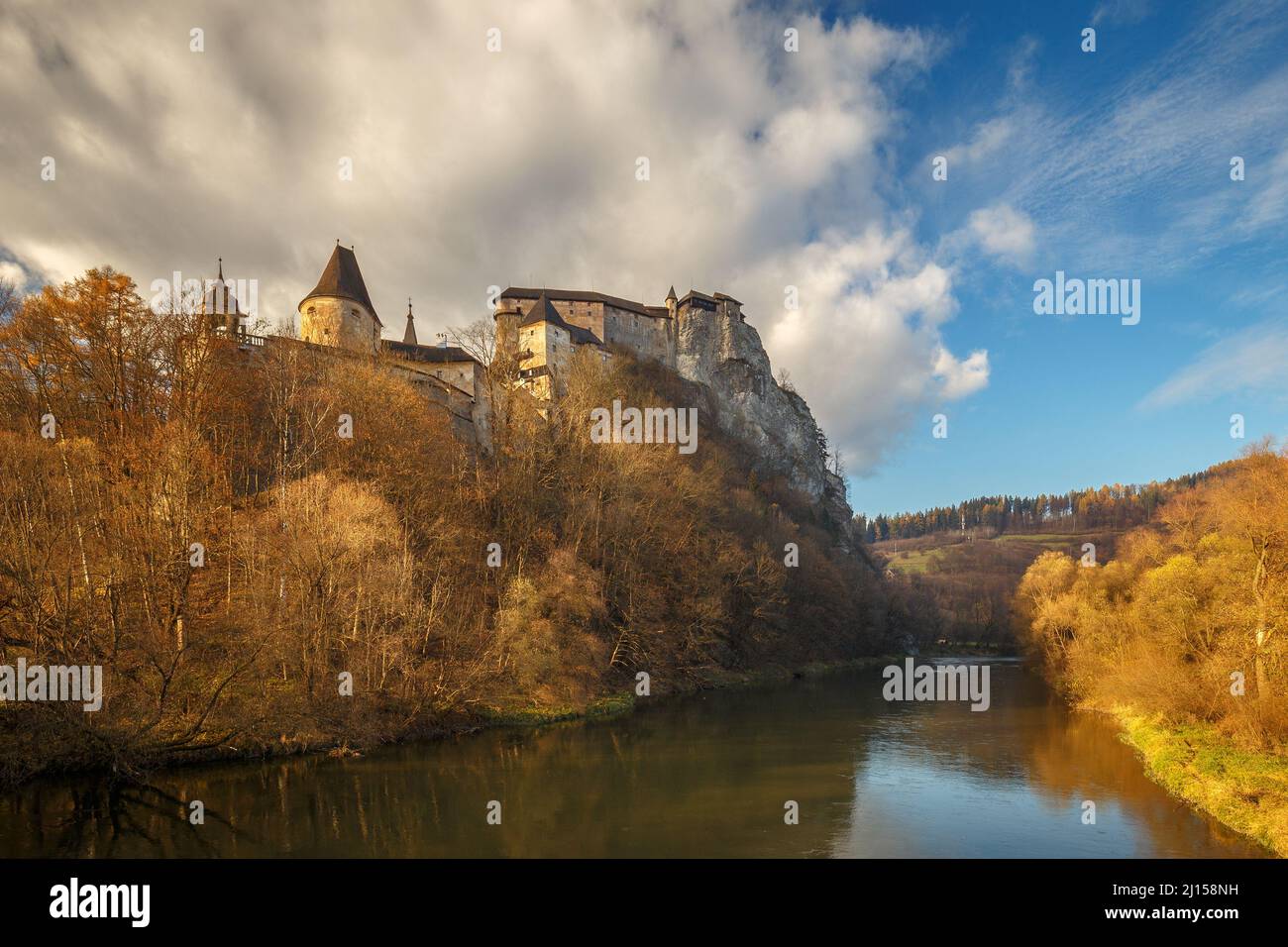 The medieval Orava Castle above a river at autumn, Slovakia, Europe ...