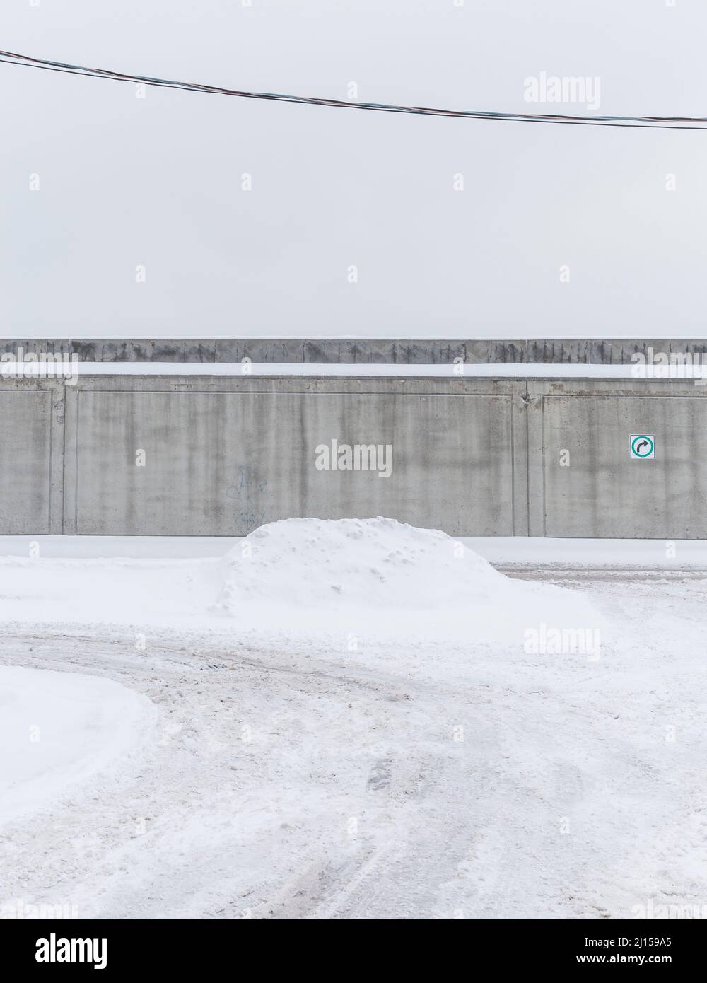 A pile of cleared snow in a car park in Longueuil, Quebec, Canada Stock ...