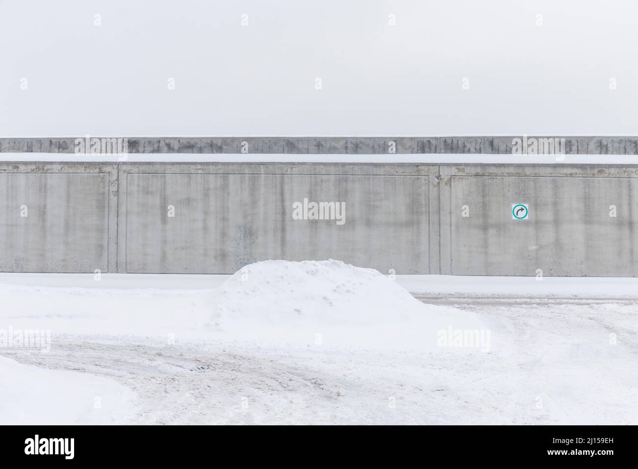 A pile of cleared snow in a car park in Longueuil, Quebec, Canada Stock ...