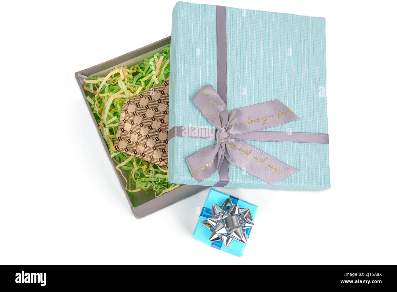 a slightly opened gift box with a bow, with a tie inside Stock Photo ...