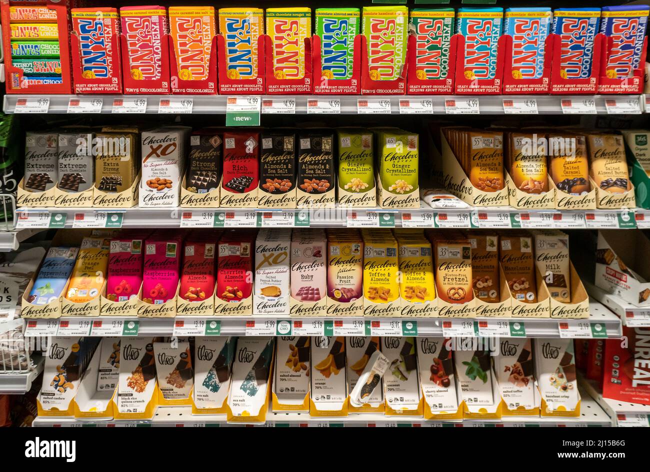 Various brands of “better-for-you” chocolate bars in a supermarket in ...