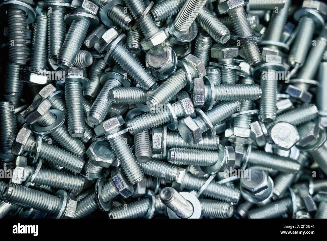 Metal screw bolts top view as industrial equipment background Stock ...