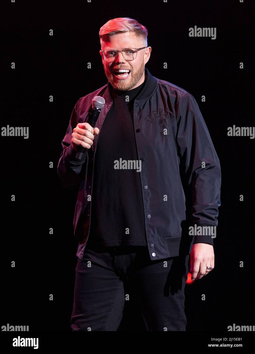 Rob Beckett performs on stage during the Teenage Cancer Trust Concert ...