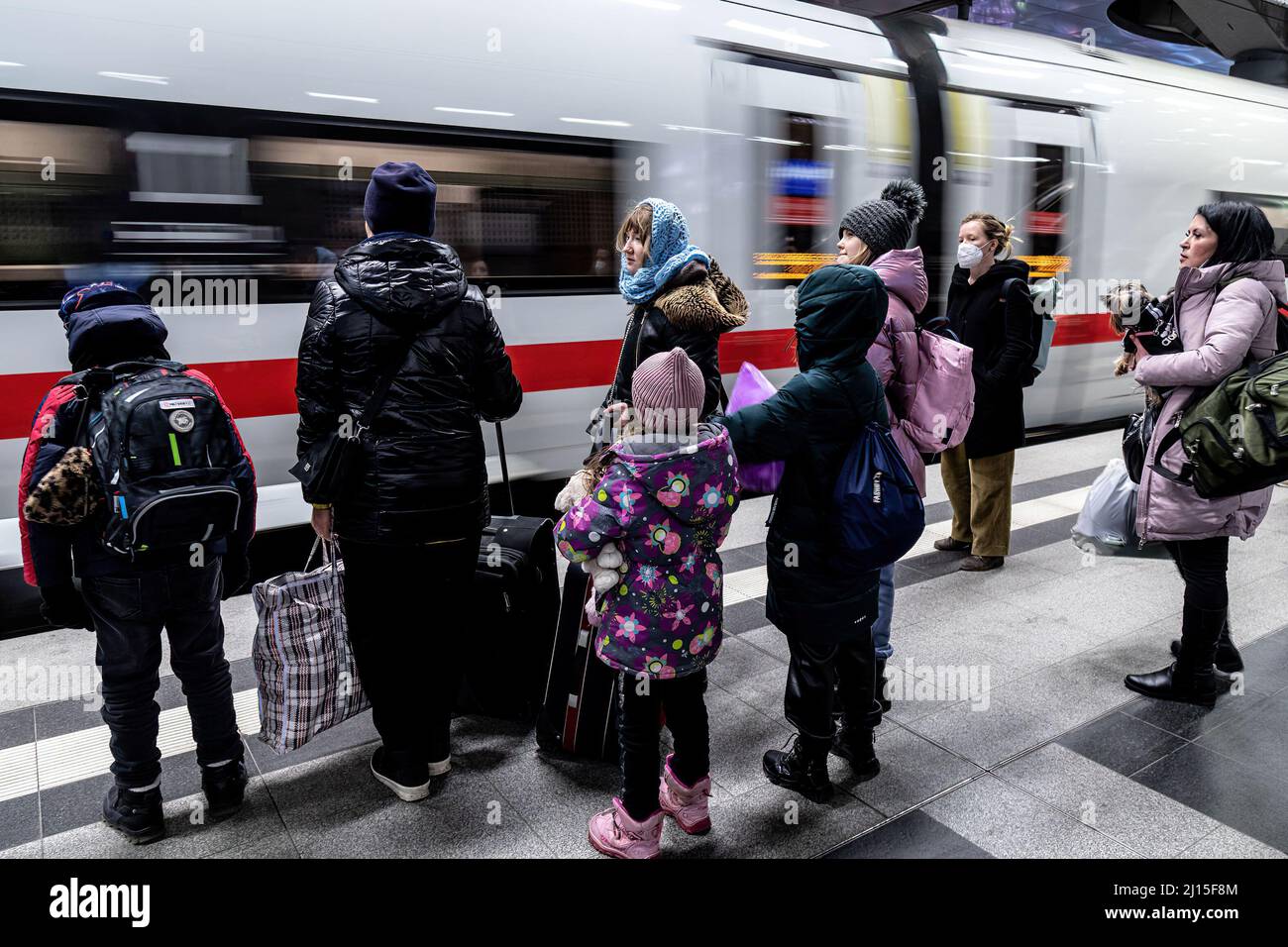 A family of Ukrainian refugees getting ready to board a train on the ...