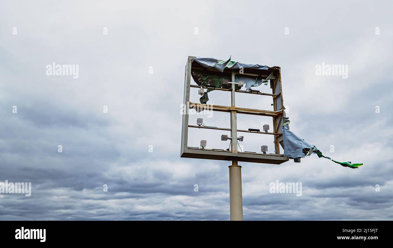 Strong winds destroyed the sign Stock Photo - Alamy